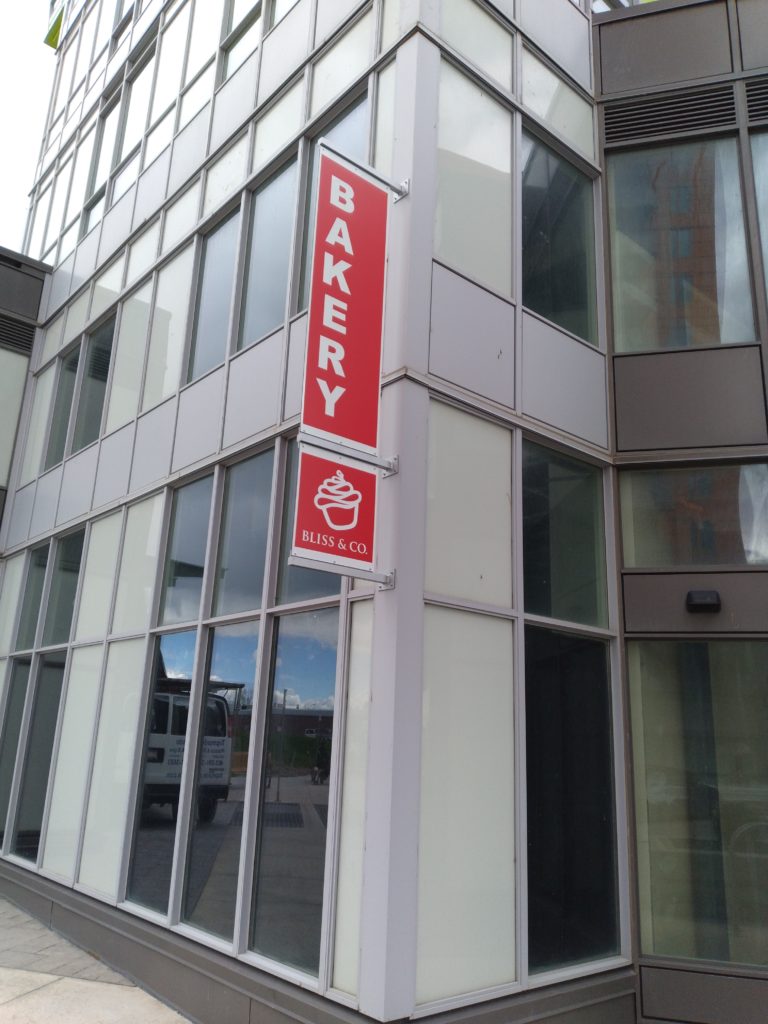 Projecting Flag Sign @ 30 Brentwood Common NW, Calgary | Topmade ...